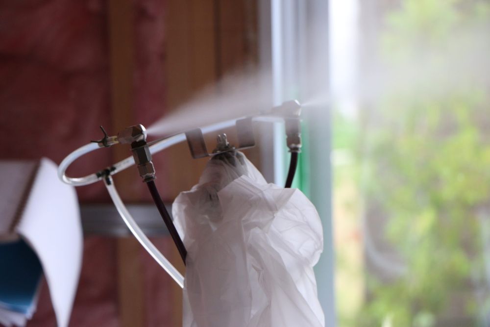 Air barrier spray to reduce air leakage in homes and commercial ...